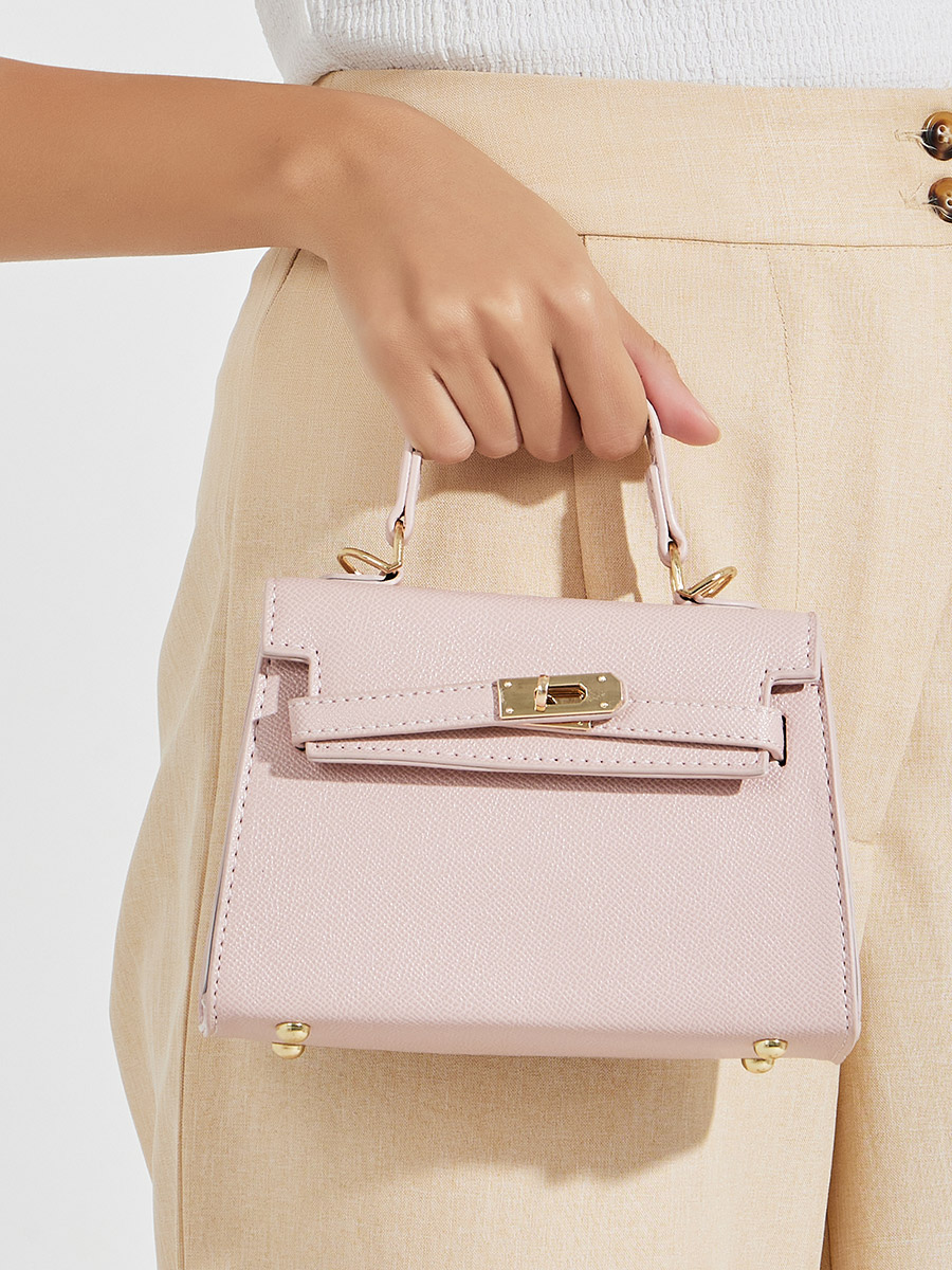 Buy Textured Handbag with Turn-Lock Closure Pink For Women | Styli UAE